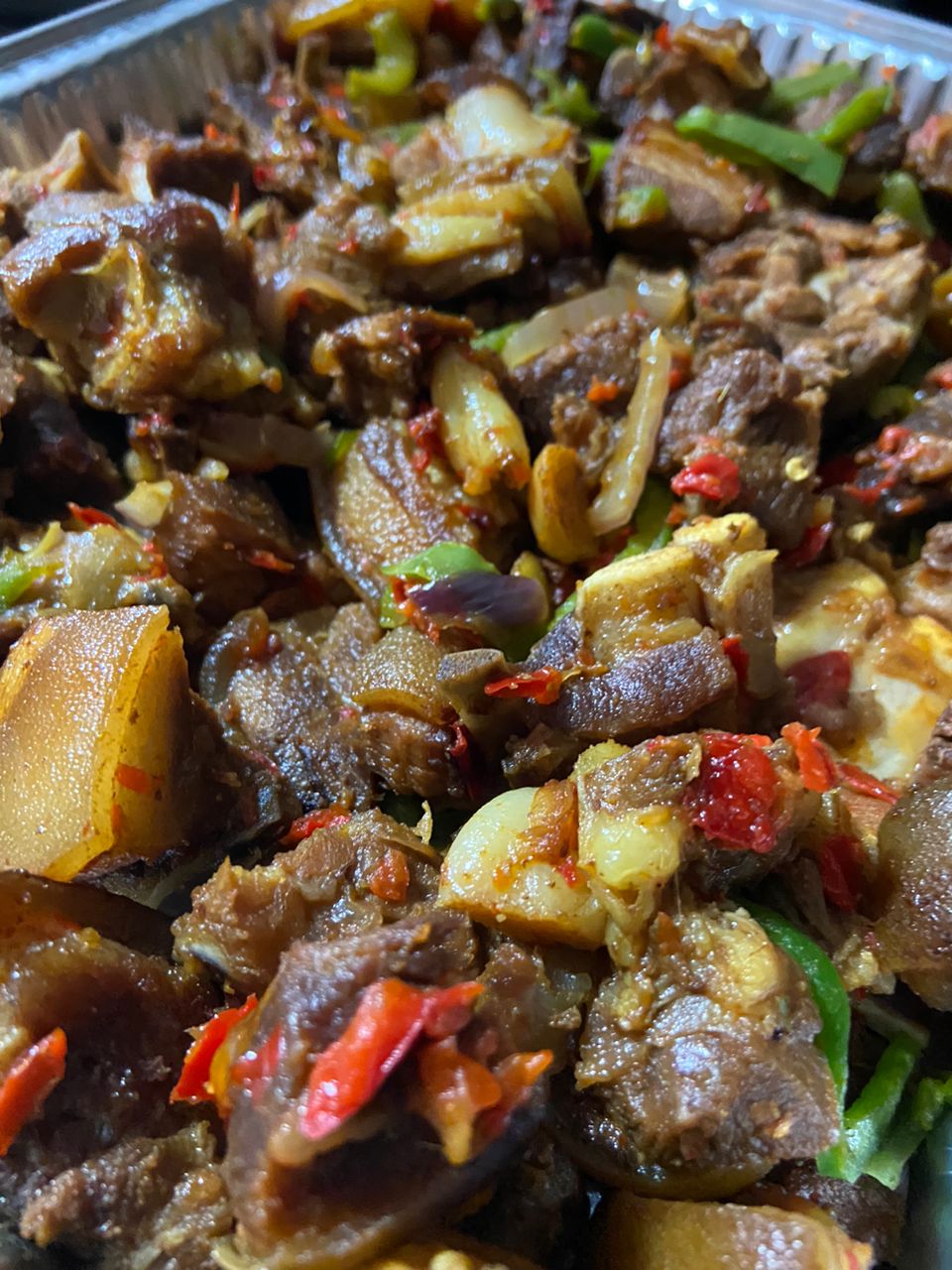 Spice Up Your Kitchen with this Ultimate Asun Goat Meat Recipe ...